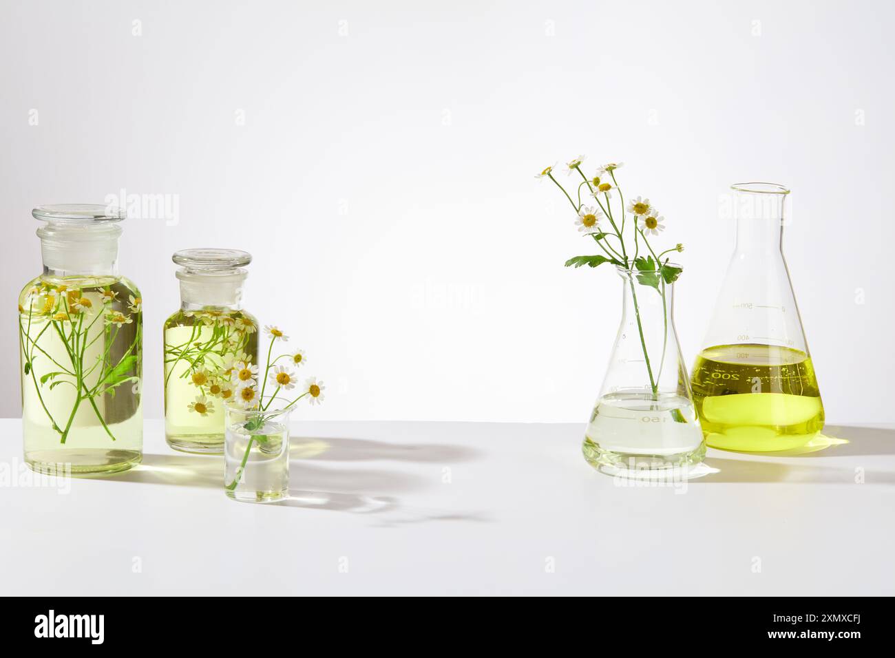 Glass transparent lab equipment, erlenmeyer flask with yellow liquid ...