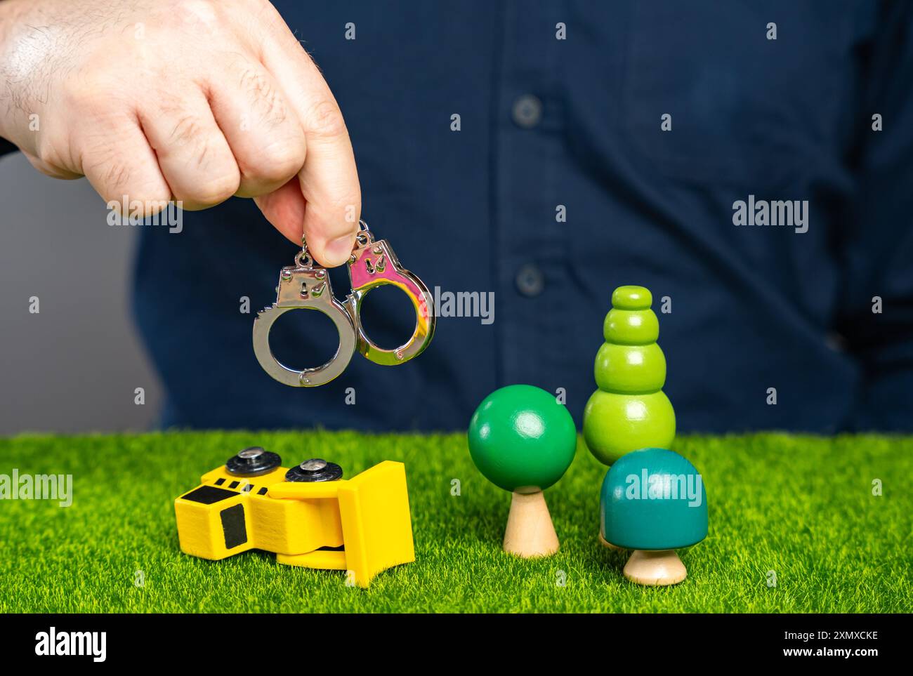 Man prevents deforestation, concept. Stop the forest from being cut ...