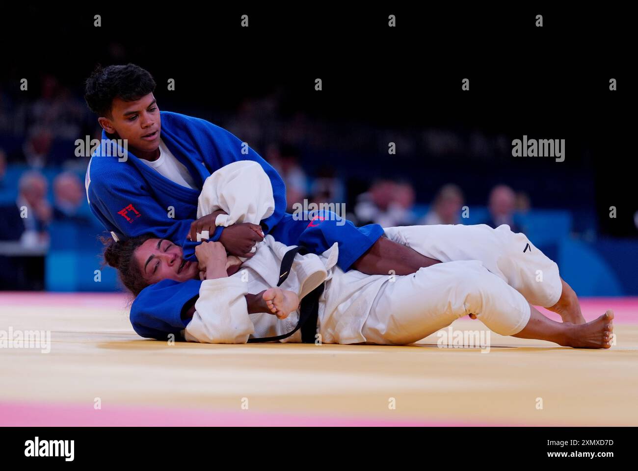 Mexico's Prisca Awiti Alcaraz (blue) and Refugee Olympic Team's Nigara ...