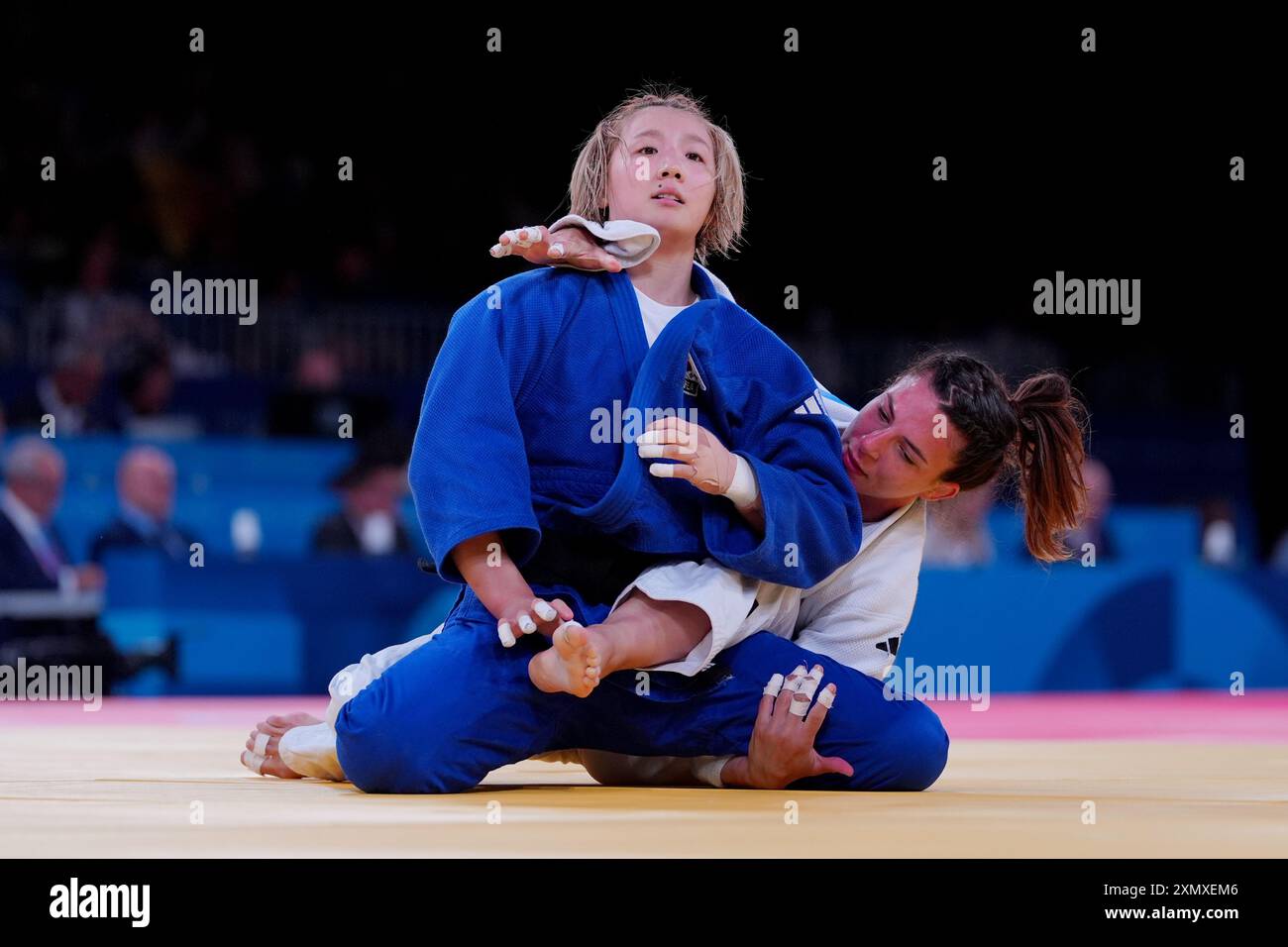 Korea's Jisu Kim (blue) and Portugal's Barbara Timo (white) during the ...