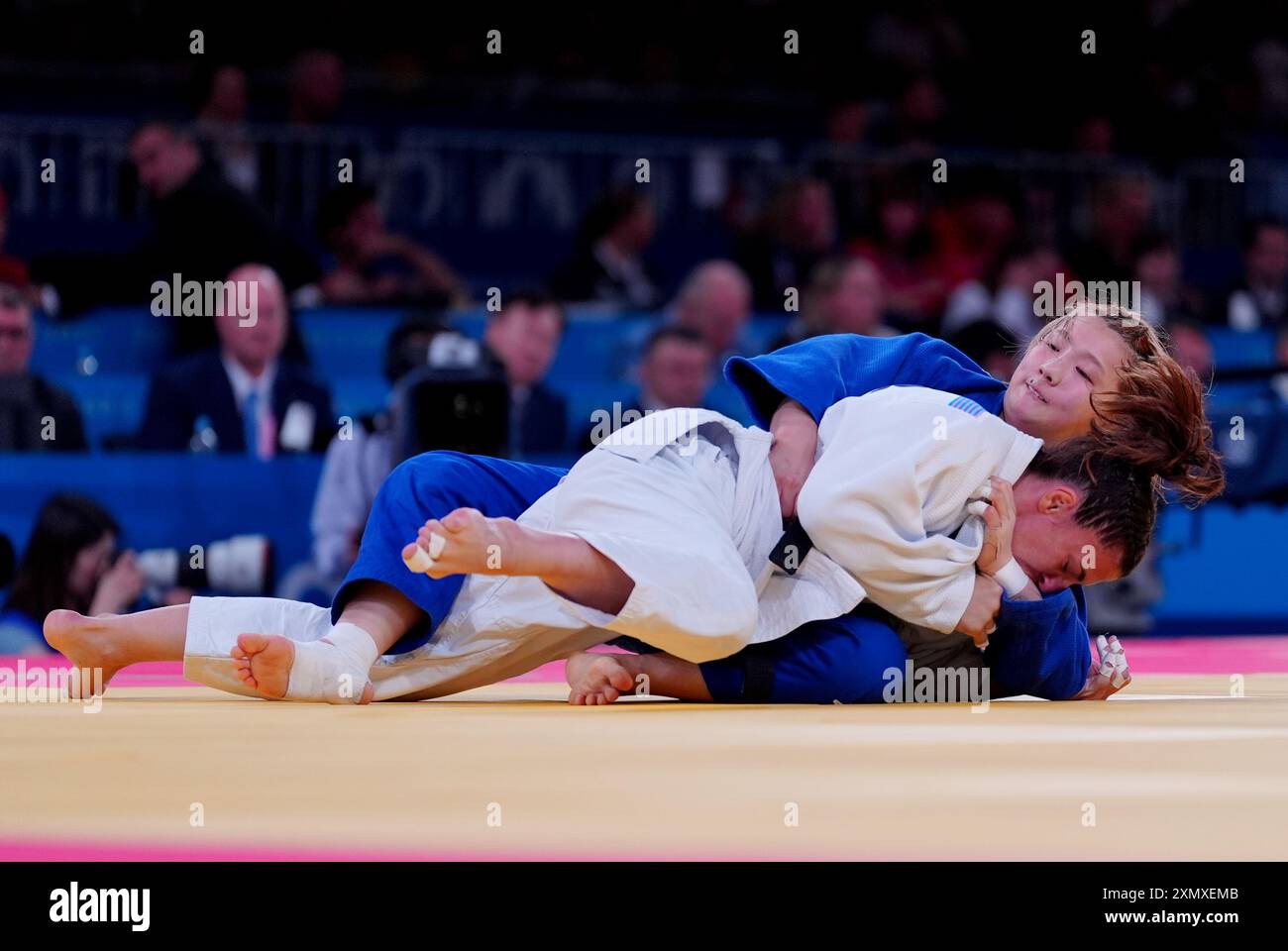 Korea's Jisu Kim (blue) and Portugal's Barbara Timo (white) during the ...