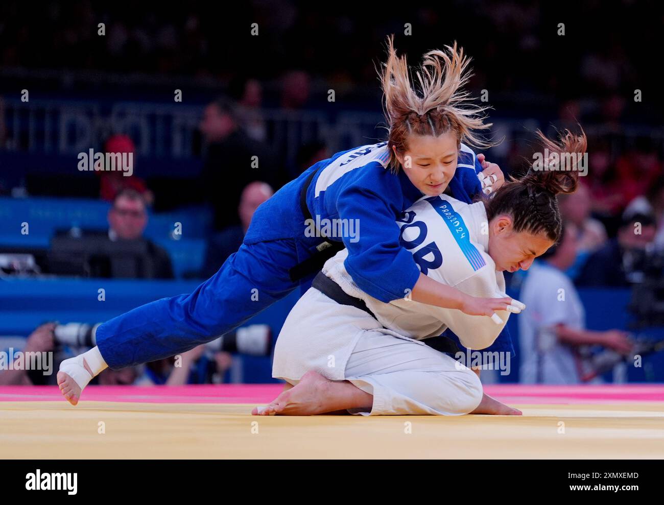 Korea's Jisu Kim (blue) and Portugal's Barbara Timo (white) during the ...