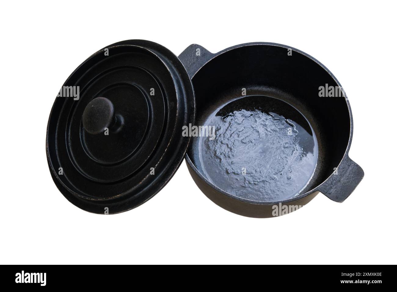 Black pot. Cast iron used saucepan with open lid isolated on white ...