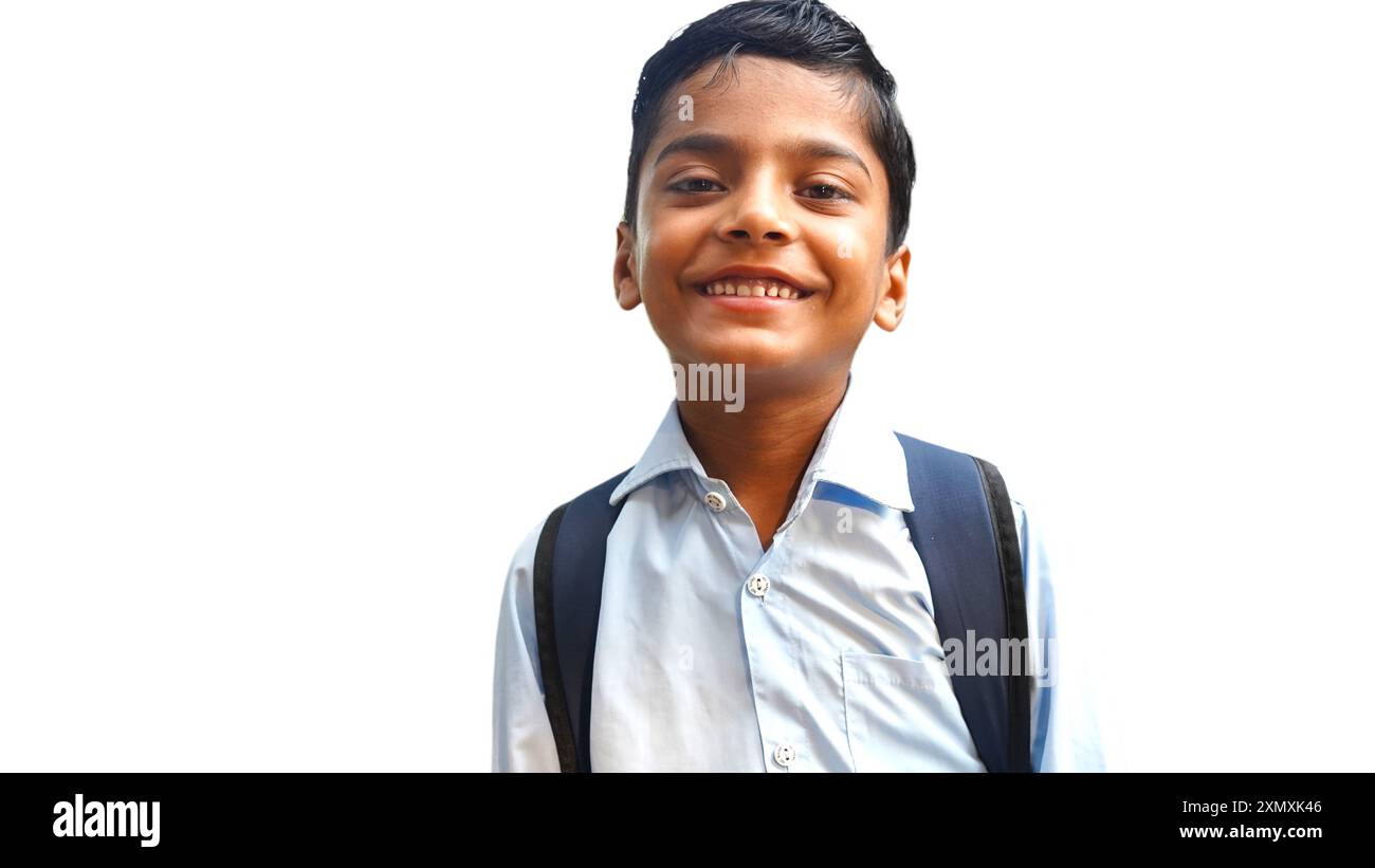 Little boy in traditional school dress at countryside, India Stock ...