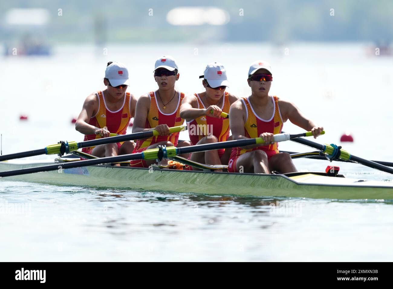 China's Wang Zifeng, Xu Xingye, Liu Xiaoxin and Zhang Shuxian prepares to compete in the women's ...