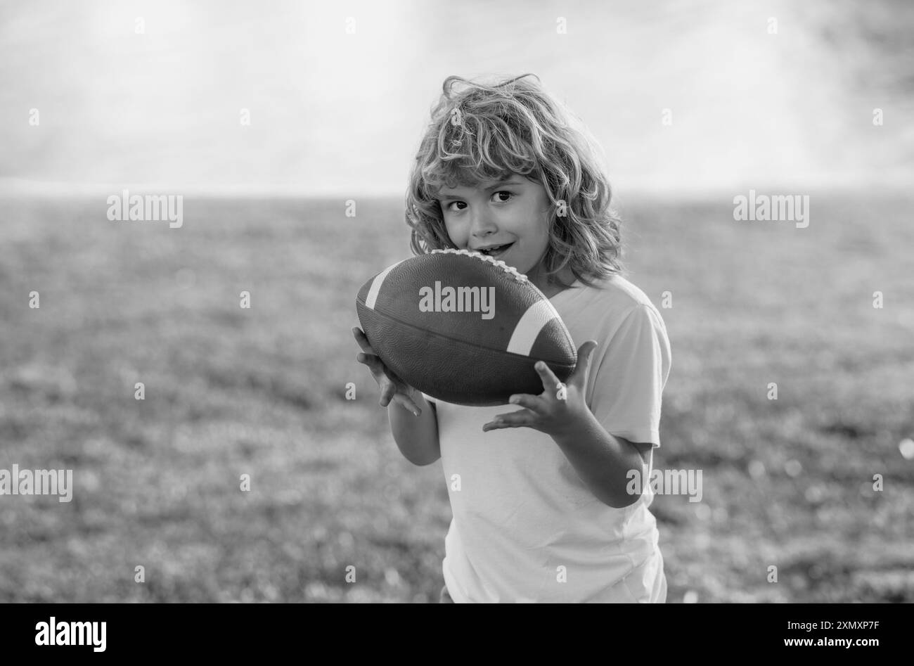 Child rugby player Black and White Stock Photos & Images - Alamy