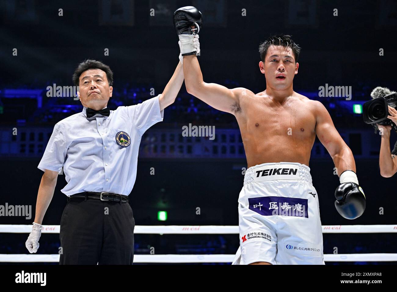 Tokyo, Japan. 20th July, 2024. Japan's Issei Aramoto, right, has his ...