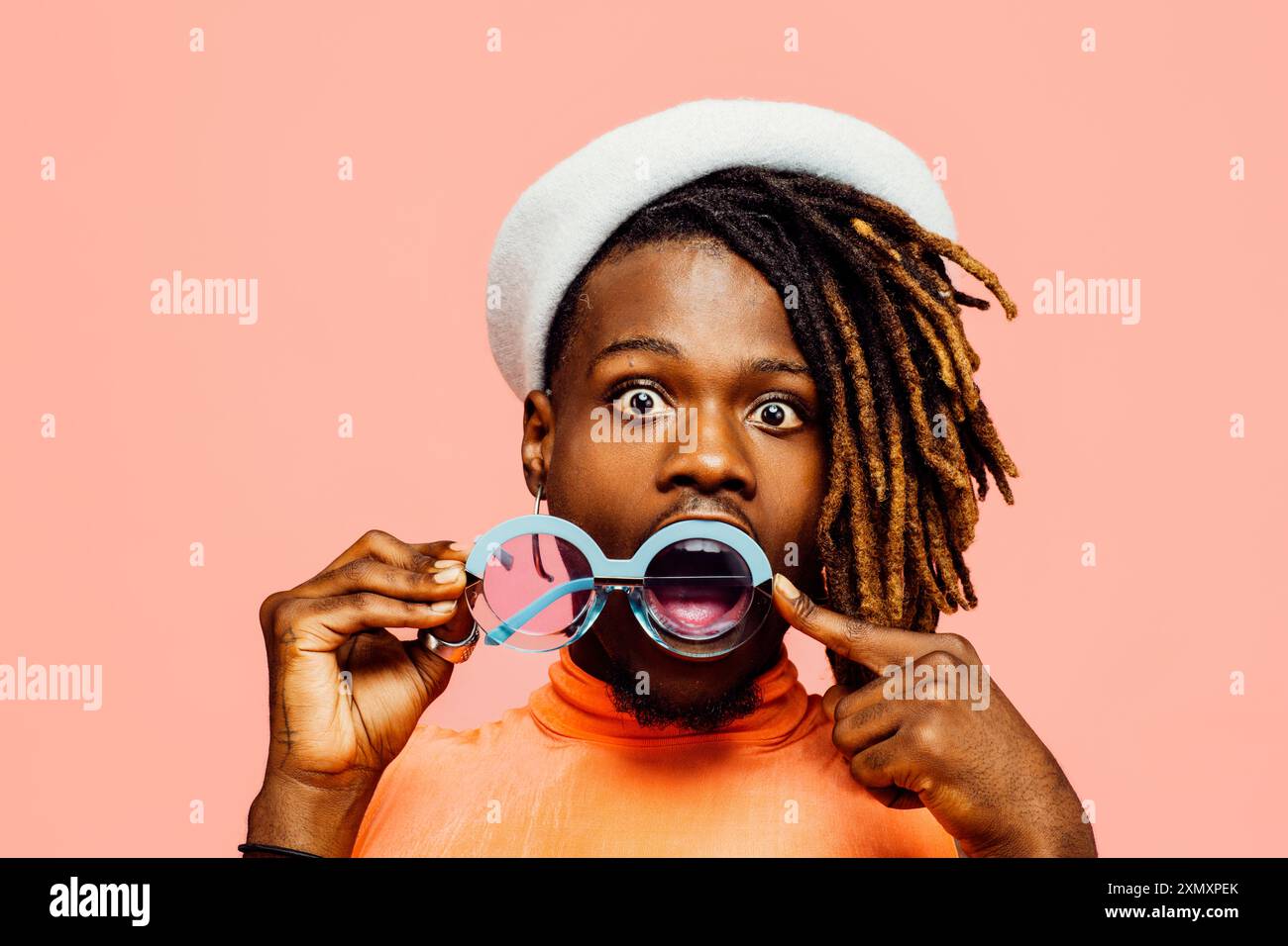 Young guy with dreadlocks hi-res stock photography and images - Alamy