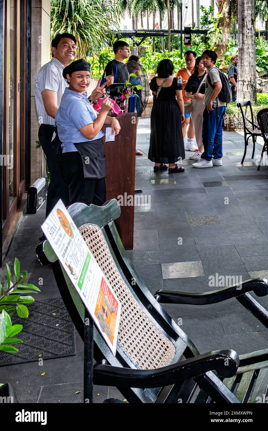 Staff, customers at Cafe Bretton, Greenbelt, Manila, Philippines Stock ...