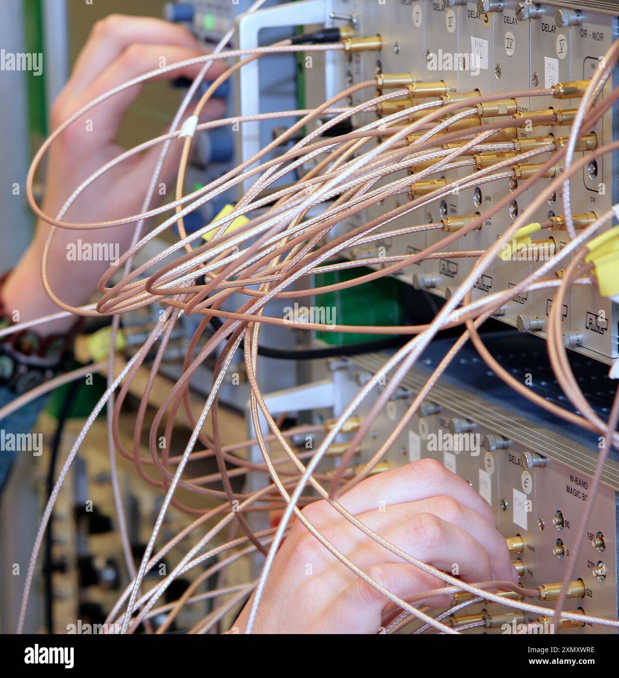 A researcher of physics doing a science experiment in the lab Stock ...