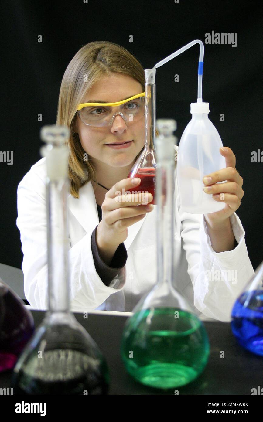 A researcher of chemistry doing a science experiment in the lab Stock ...