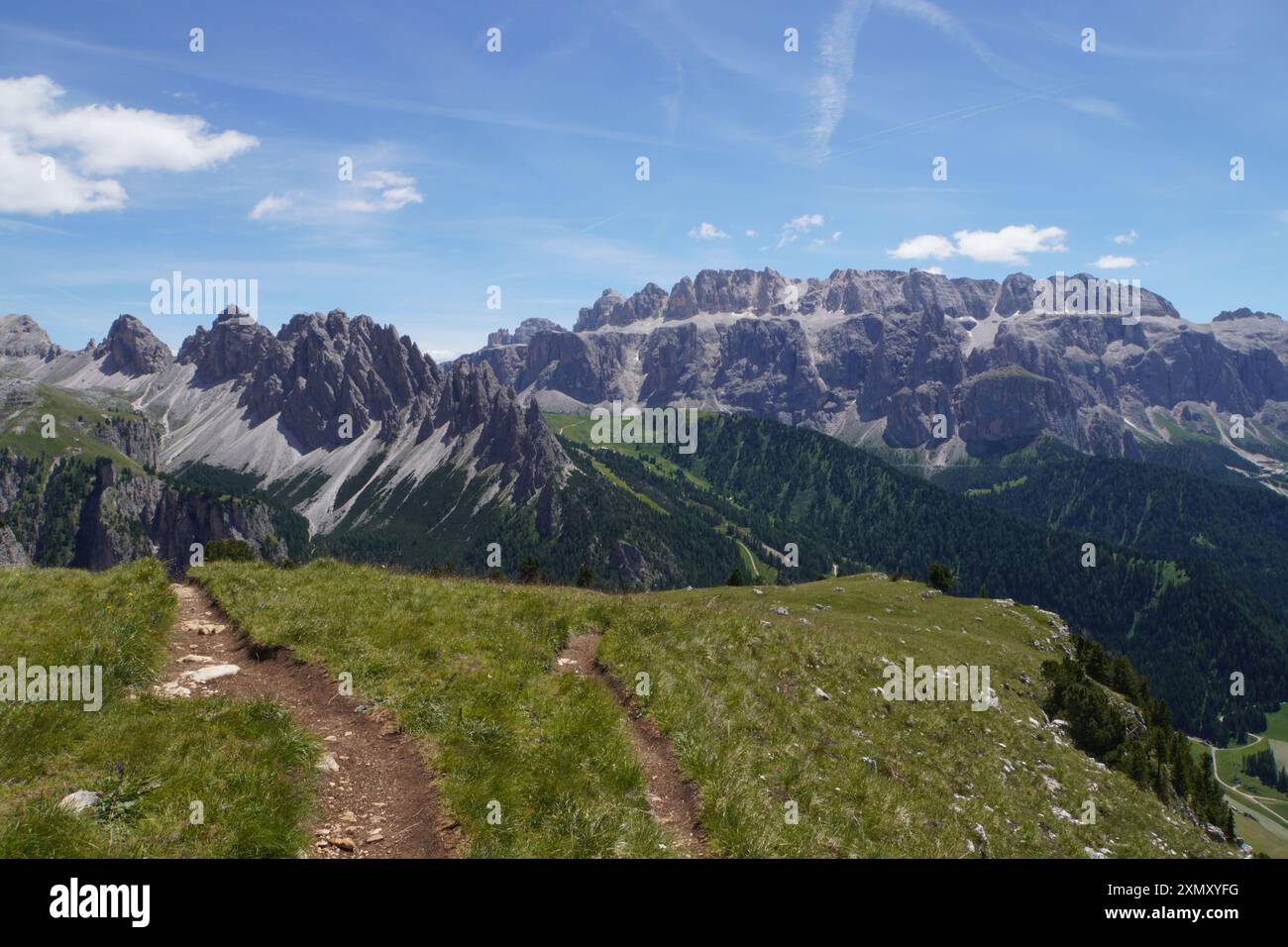 Hiking path in front of the Sella Massif in the Italian Alps Stock ...