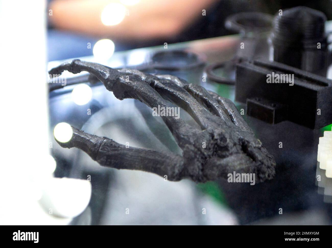 Art Object in form of human skeleton hand printed on 3D printer. Model ...