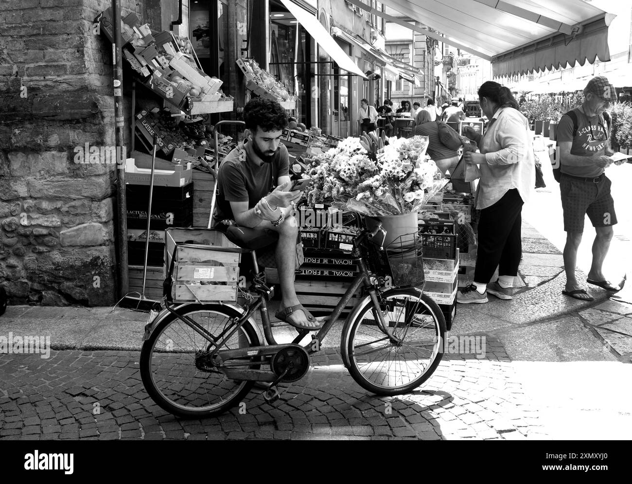 Flowers on bicycle Black and White Stock Photos & Images - Alamy