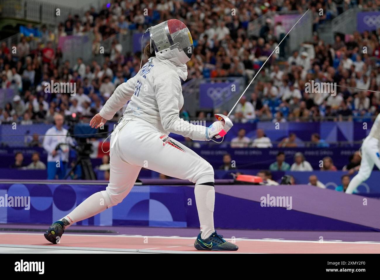 Egypt's Nada Hafez competes with United States' Elizabeth Tartakovsky ...