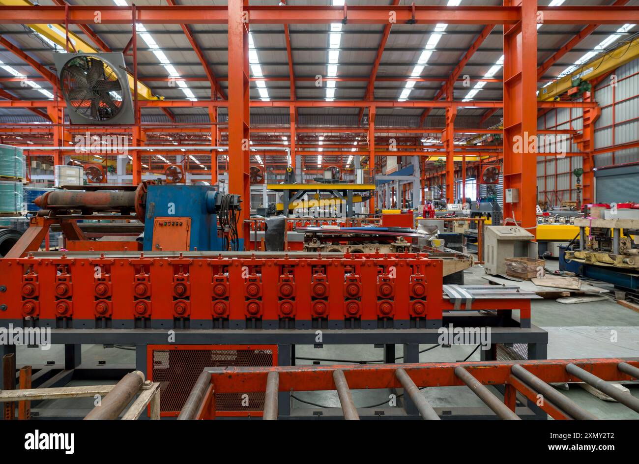 A robust industrial machine engaged in the process of manufacturing ...