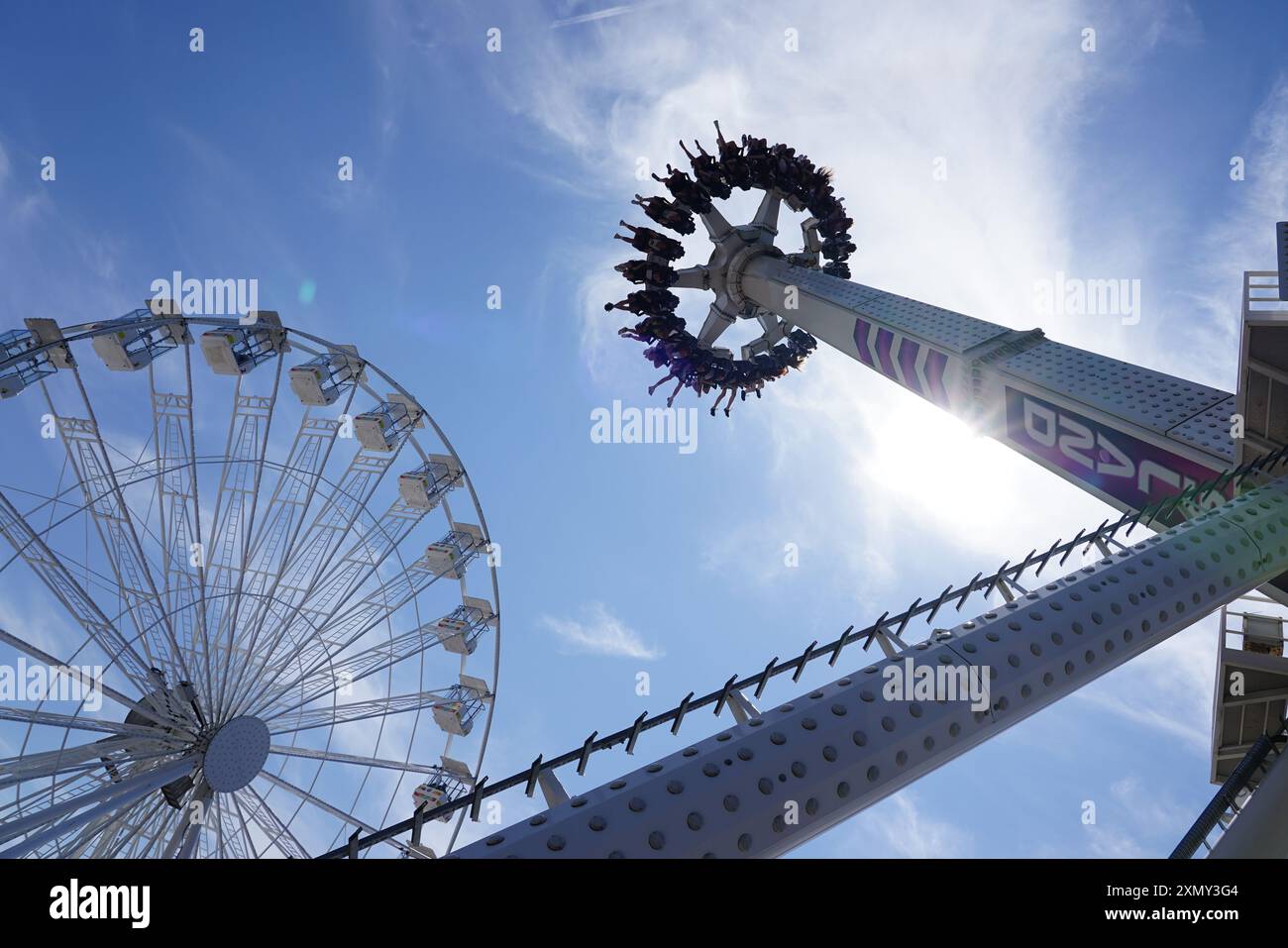 People on the Axis ride at Adventure Island in Southend-on-Sea, as the ...