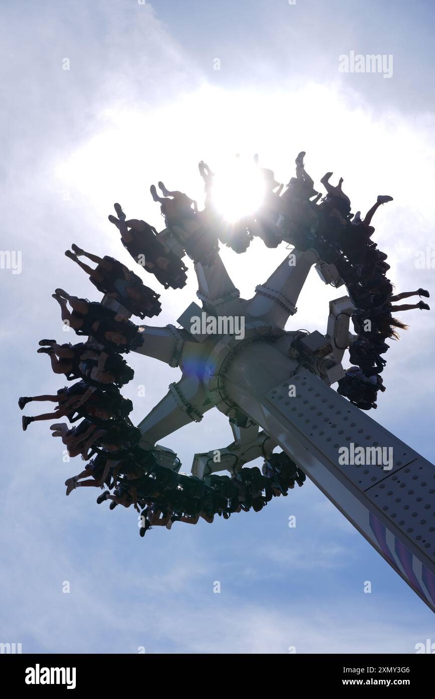 People on the Axis ride at Adventure Island in Southend-on-Sea, as the ...