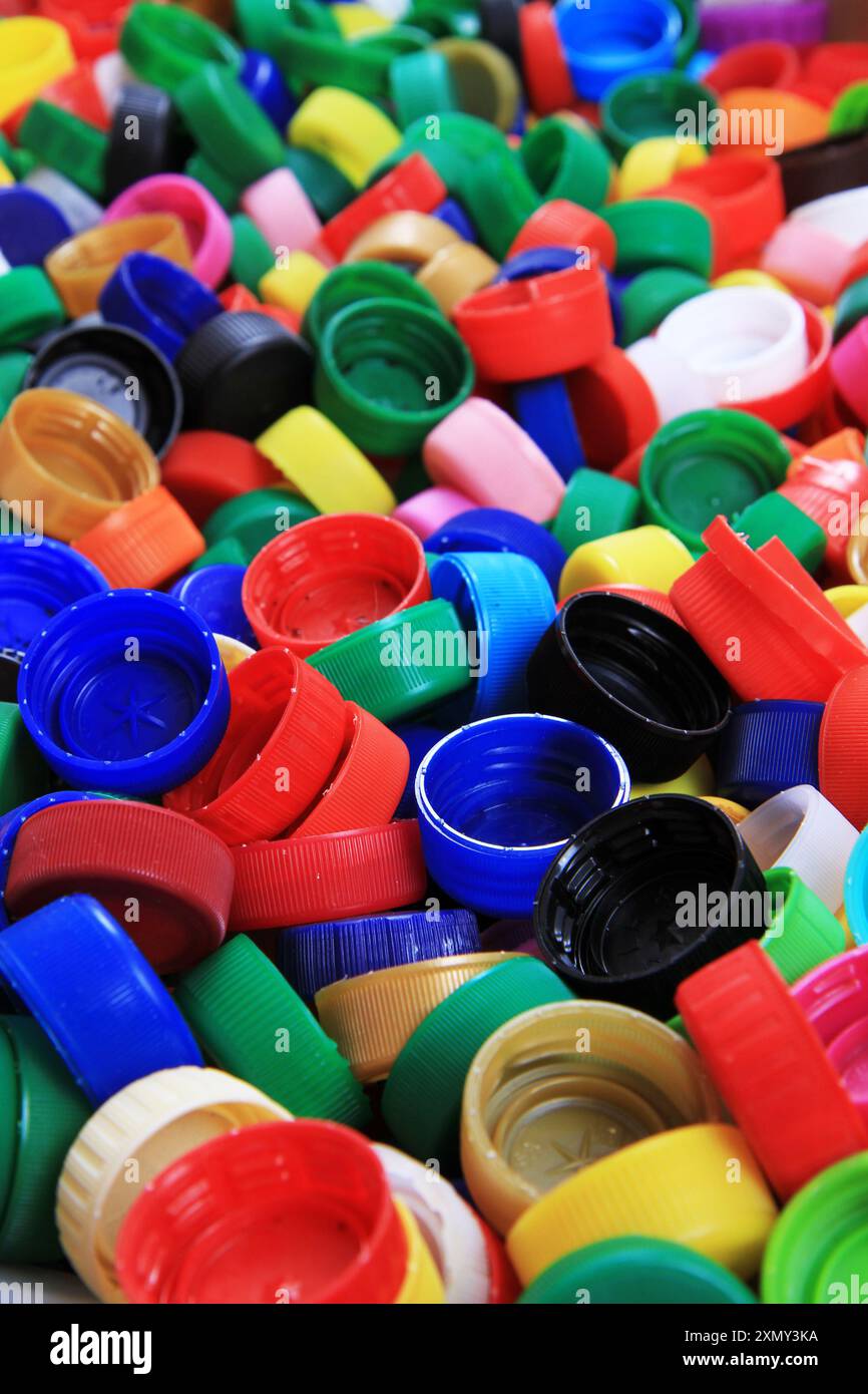 plastic caps texture as recycle industry background Stock Photo - Alamy