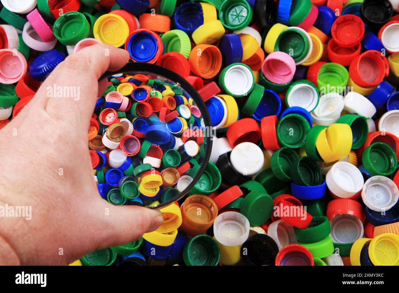 plastic caps texture as recycle industry background Stock Photo - Alamy