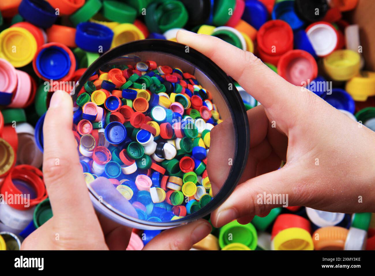plastic caps texture as recycle industry background Stock Photo - Alamy