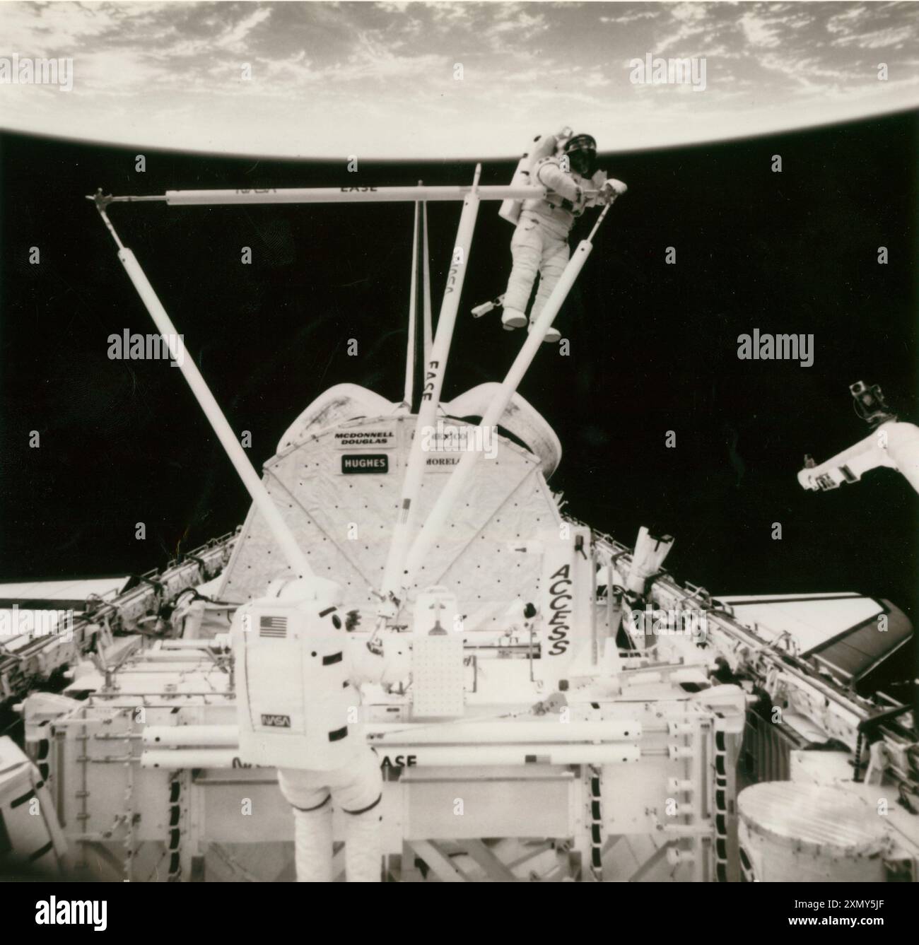 Astronauts during an EVA outside a Space Shuttle Stock Photo - Alamy