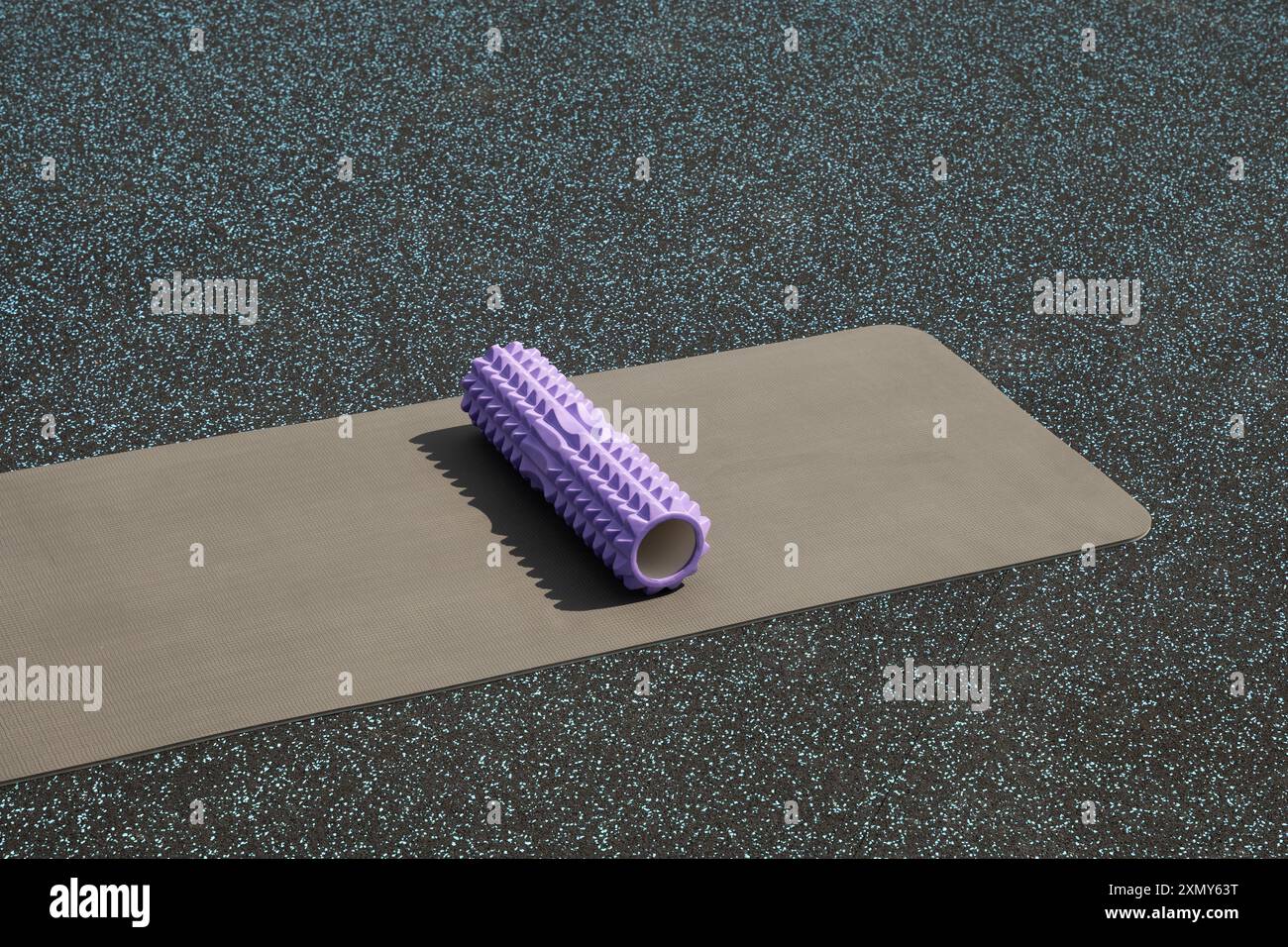 Foam roller and exercising mat on sports ground for training. Outdoor ...