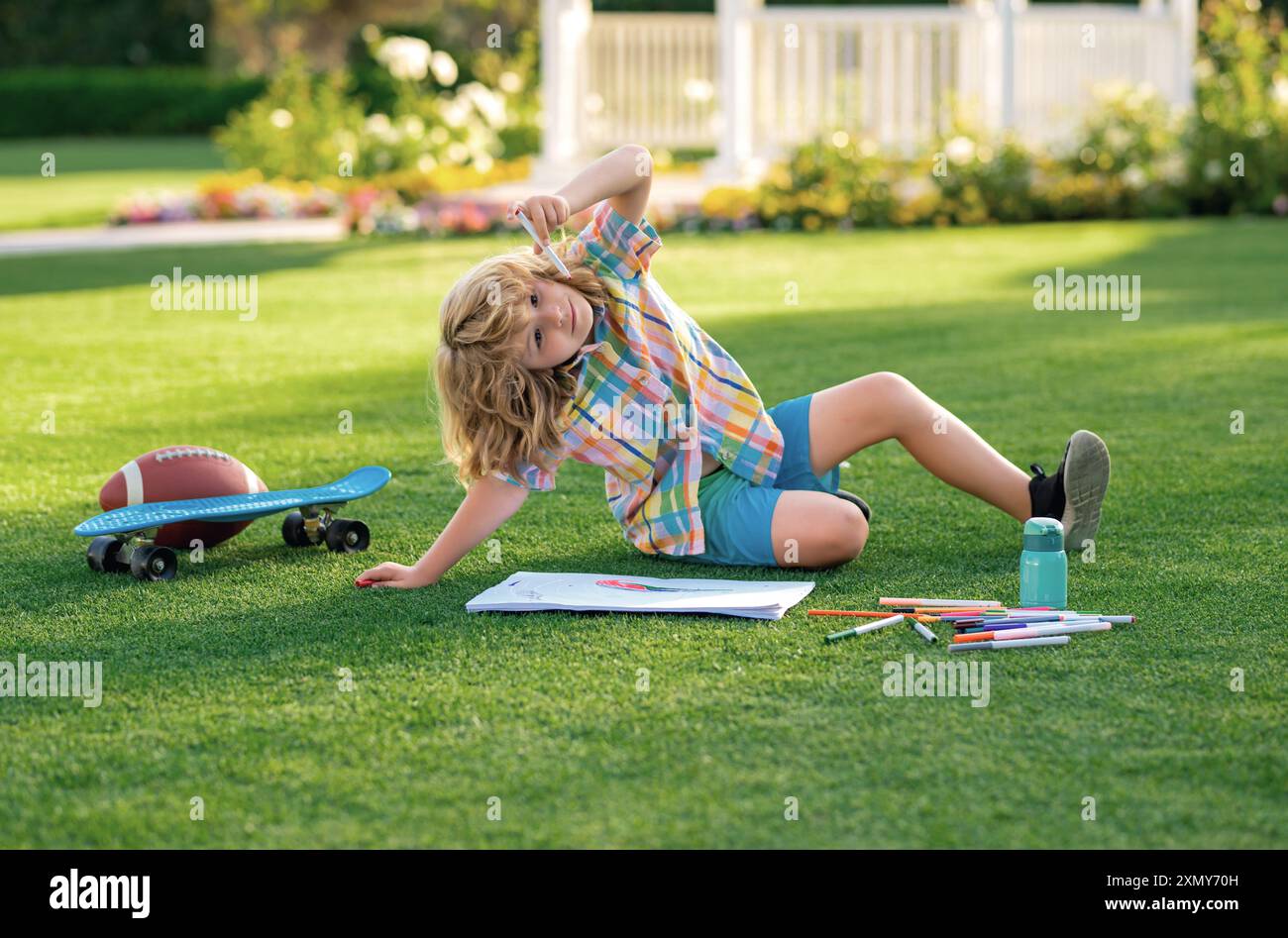 Child artist, kids crafts. School kids drawing in summer park, painting ...
