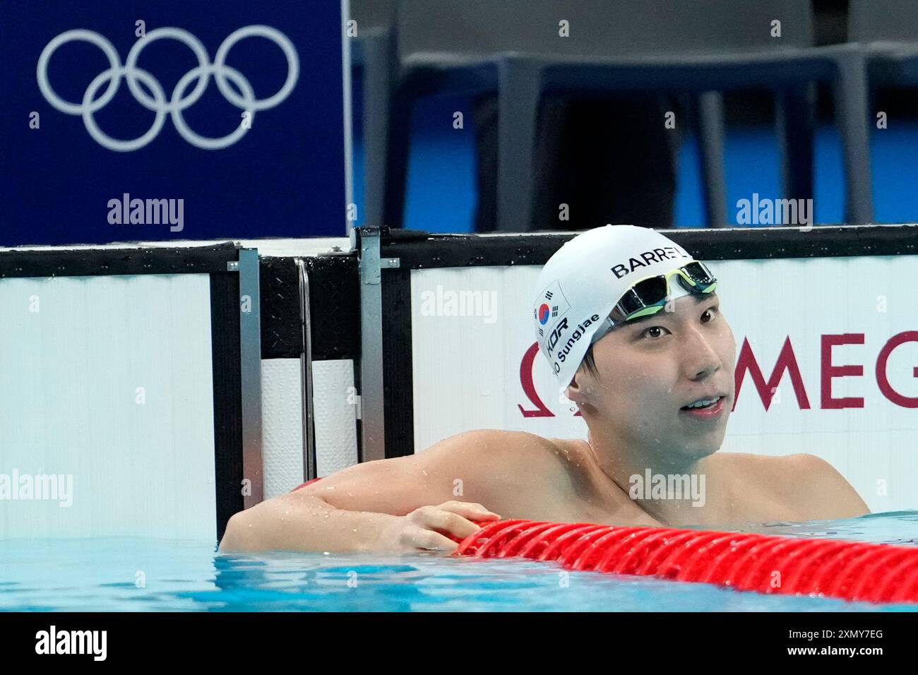 Sung Jae Cho, of South Korea, reacts after his heat in the men's 200 ...