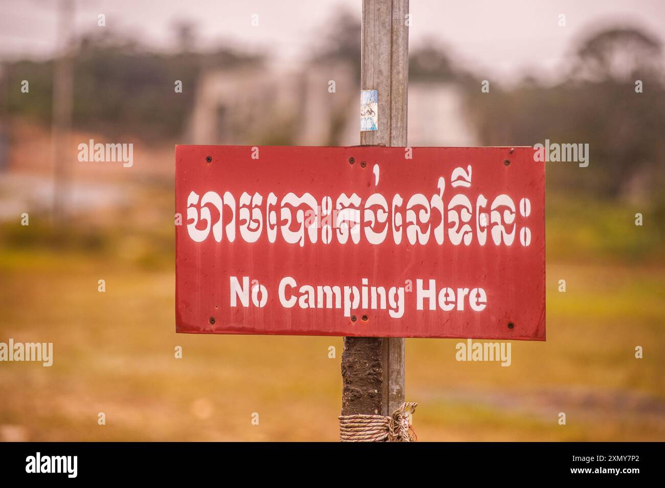 bilingual "No Camping Here" sign. Popokvil Waterfall. Bokor Mountain ...