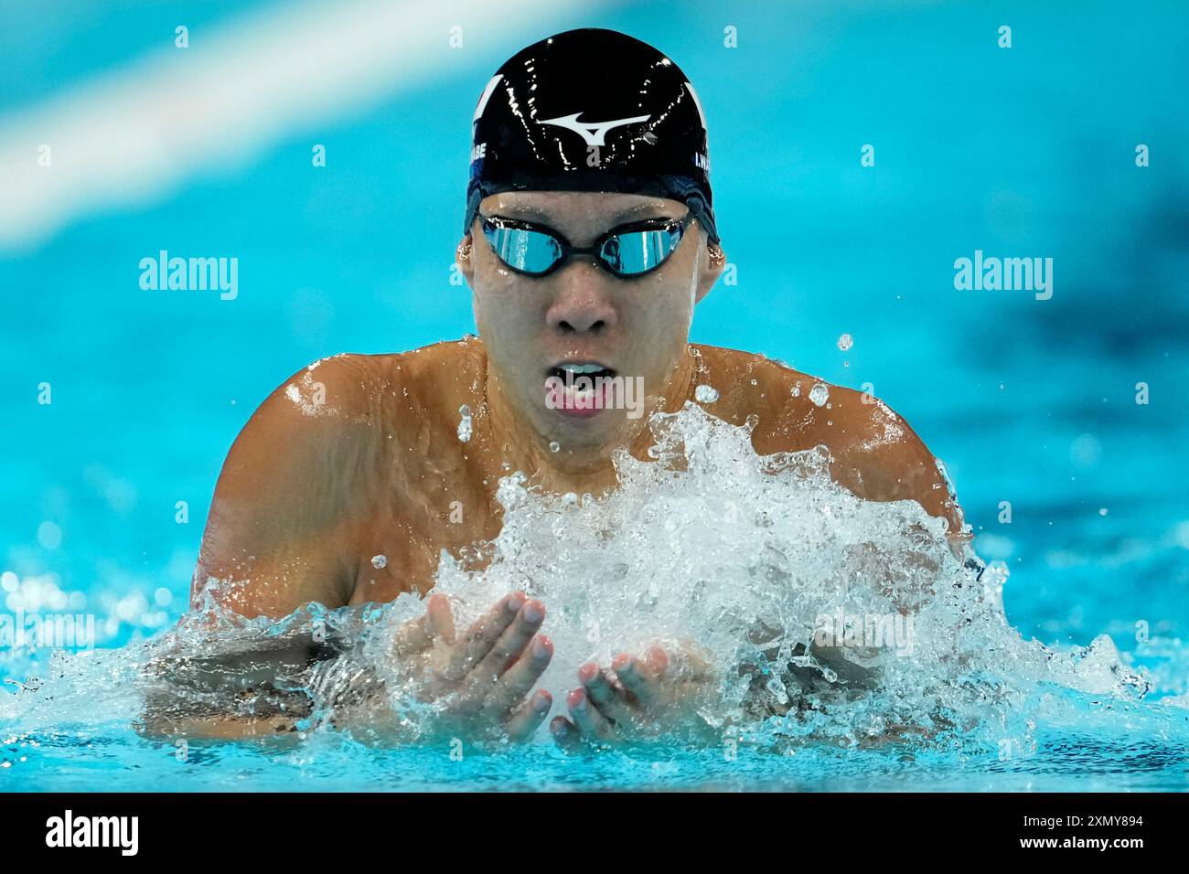 Ippei Watanabe, of Japan, competes during a heat in the men's 200-meter ...