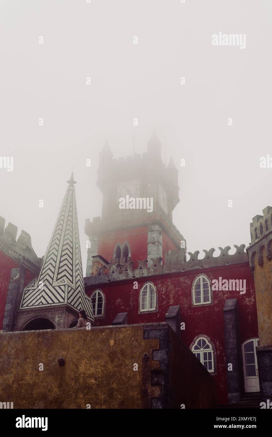 The iconic buildings the Pena Palace as the iconic red clock tower ...