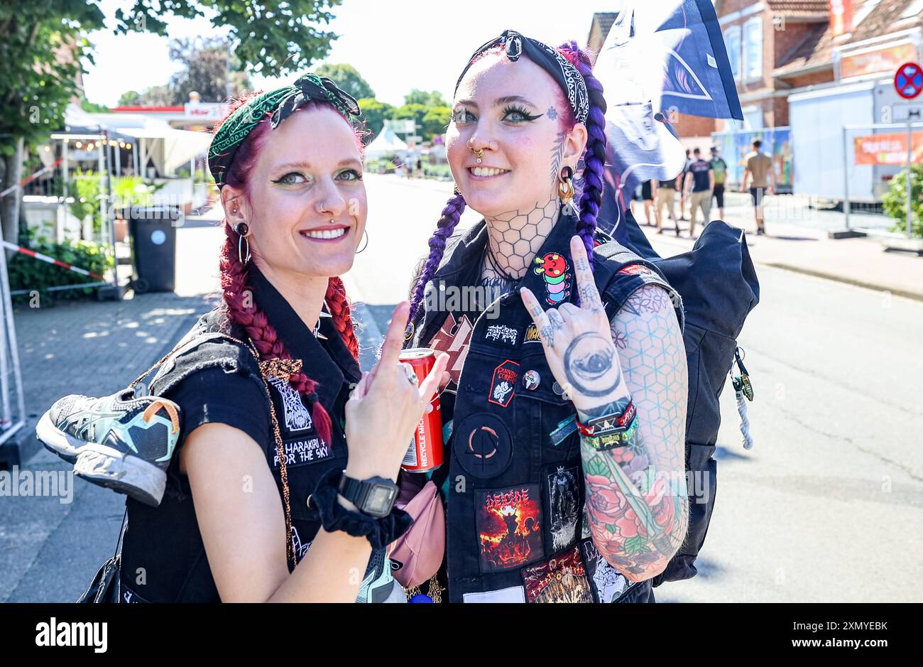 Wacken, Germany. 30th July, 2024. Bodil (l, 24) and Lia (27), local ...