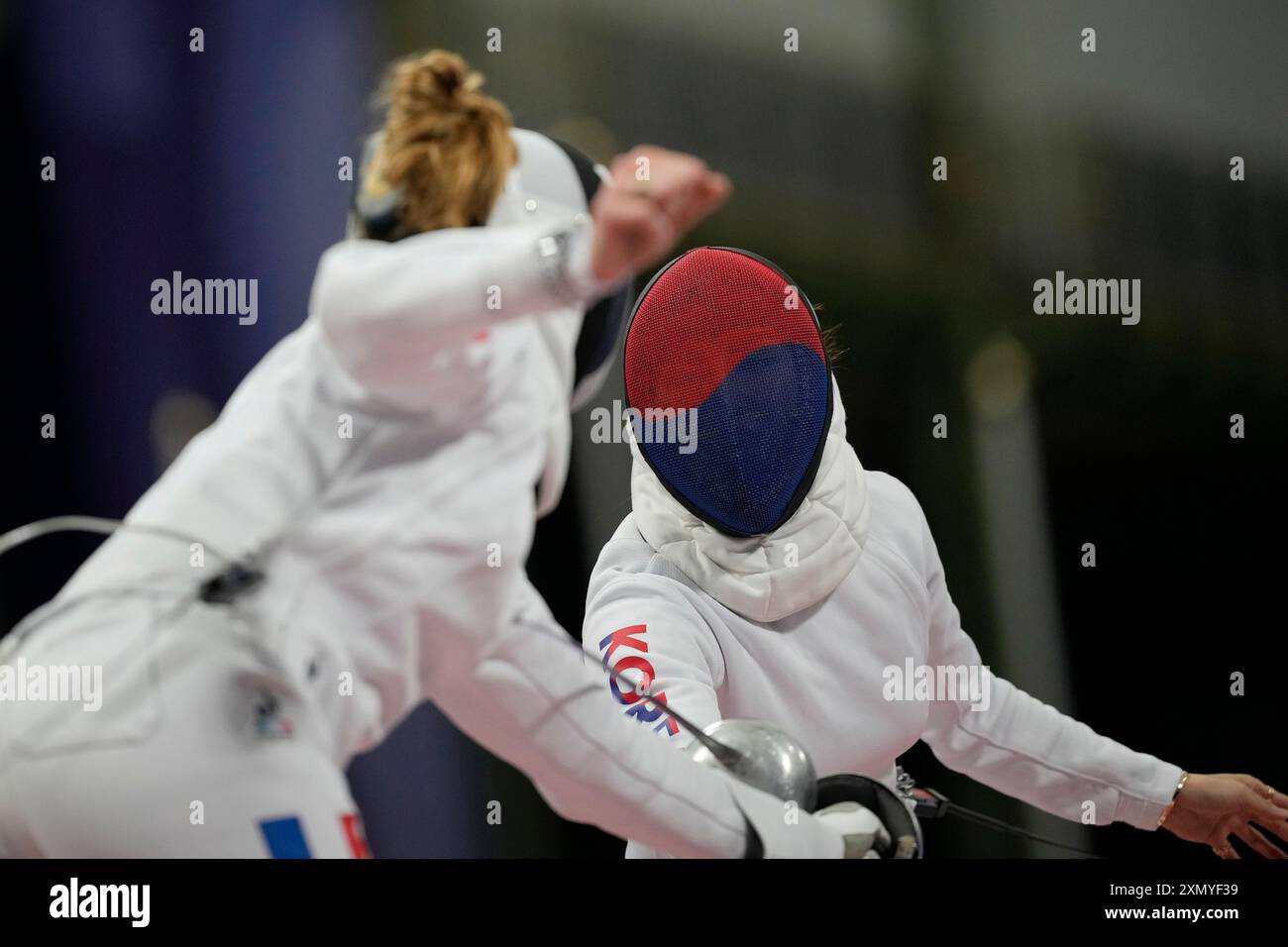 South Korea's Lee Hyein, right, competes with France's Auriane Mallo ...