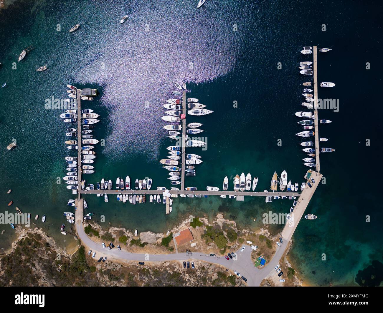 Aerial view of a marina in Sithonia, Greece, with numerous boats and ...