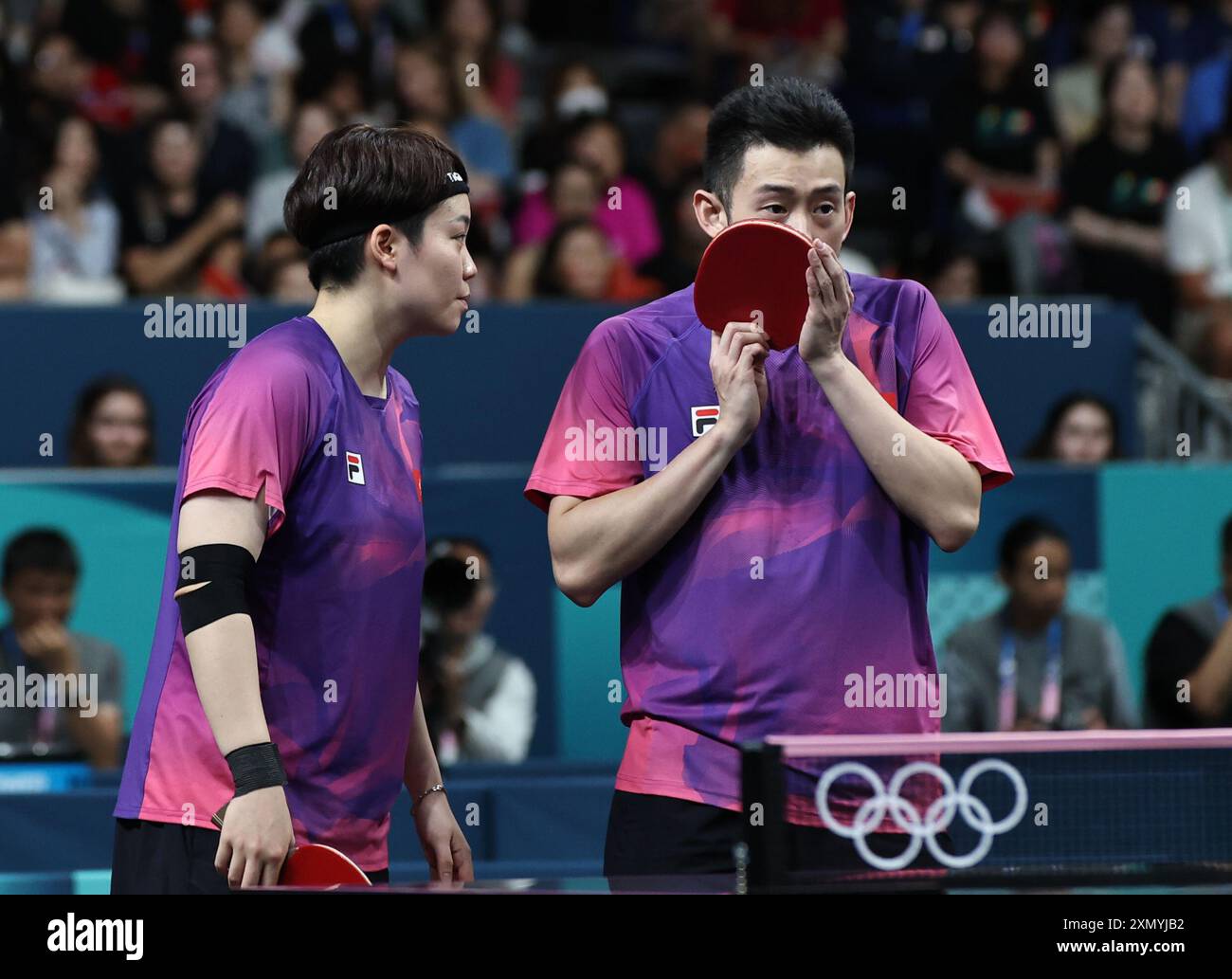 Paris, France. 30th July, 2024. Wong Chun Ting (R)/Doo Hoi Kem of China's Hong Kong react during ...