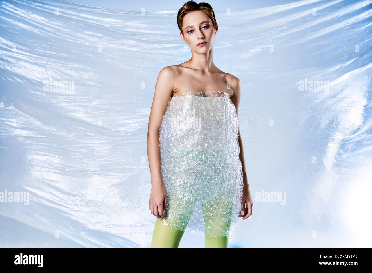 A woman models a dress made from bubble wrap, a sustainable fashion ...