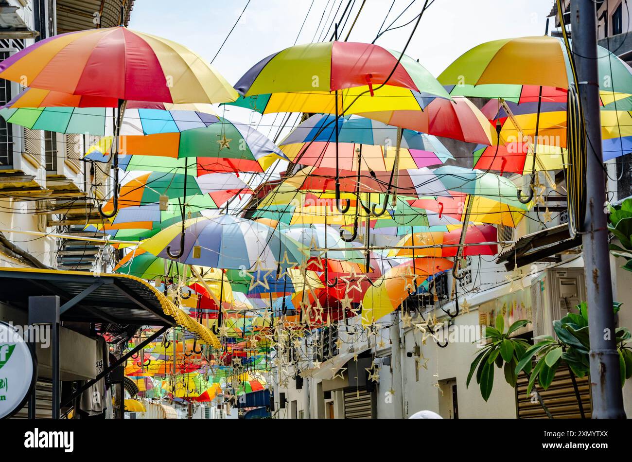Decorative, colourful, umbrellas hanging overhead along Lorong Song ...