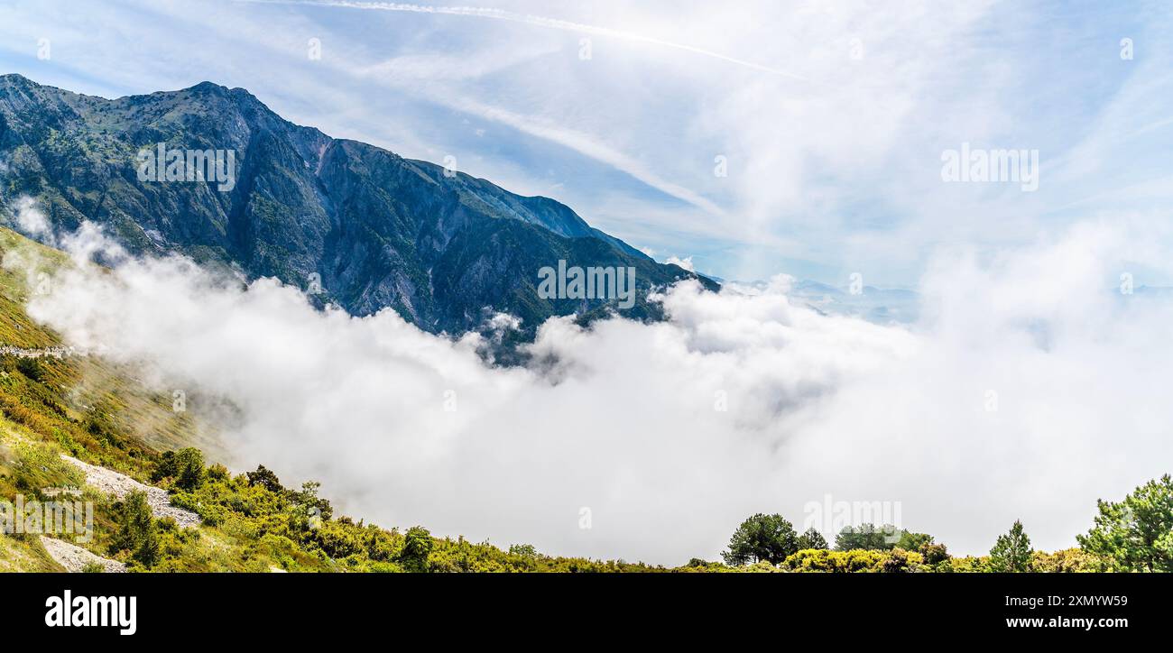 A panorama view of mist filled valleys in the Llogara National Park ...