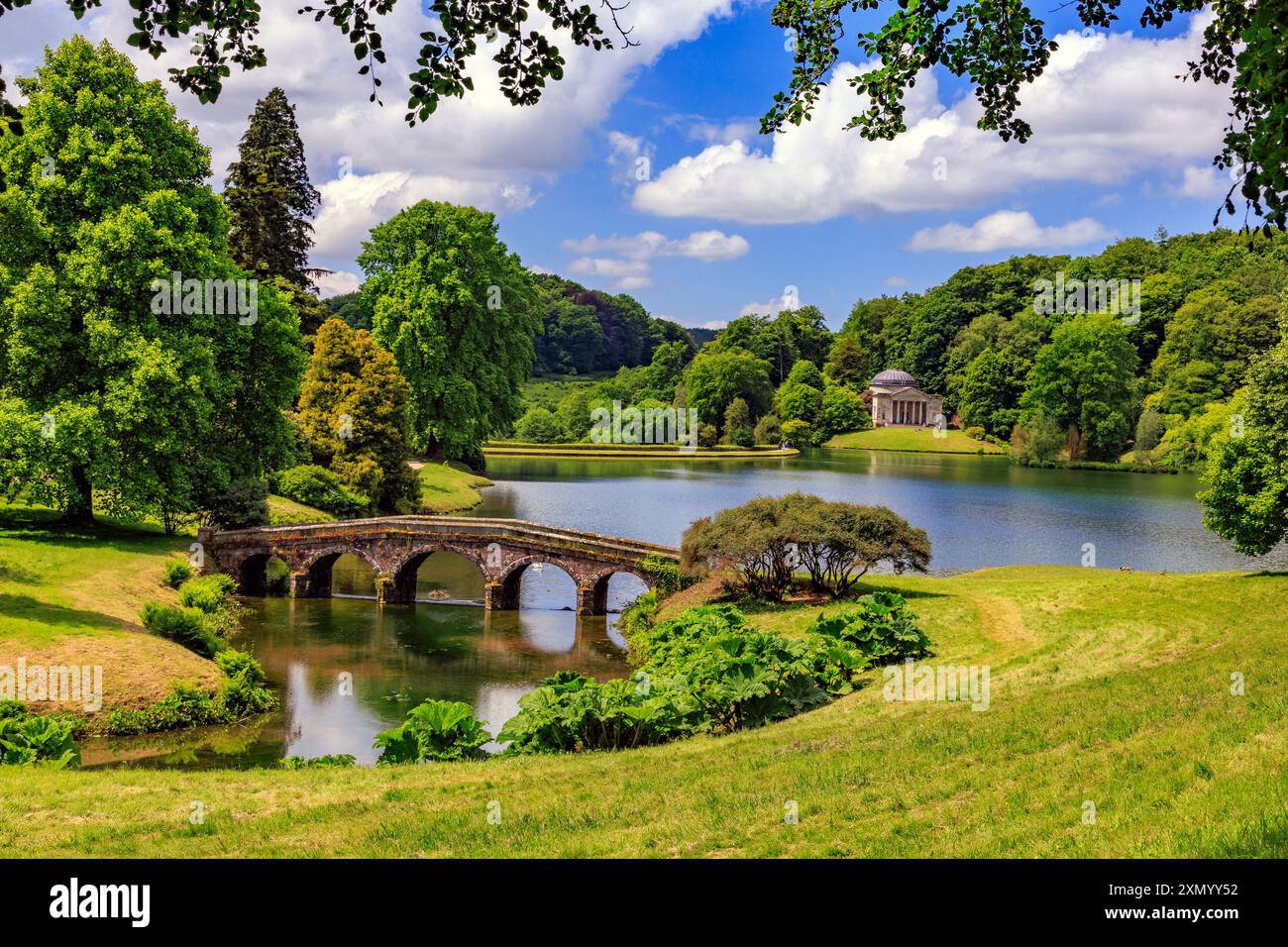 The attractive Palladian bridge and Pantheon temple across the lake at ...