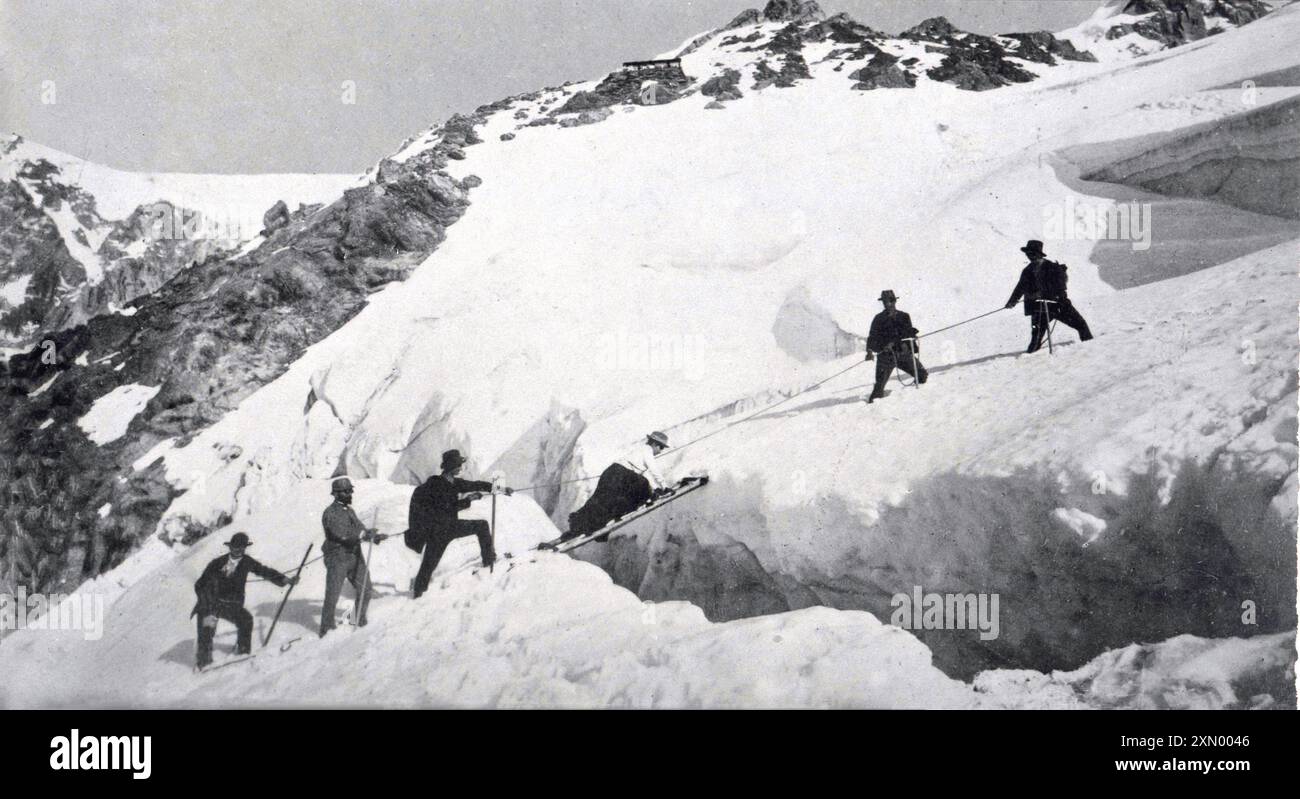 1930s, historical, climbers, lady crossing a raven using a ladder, male ...