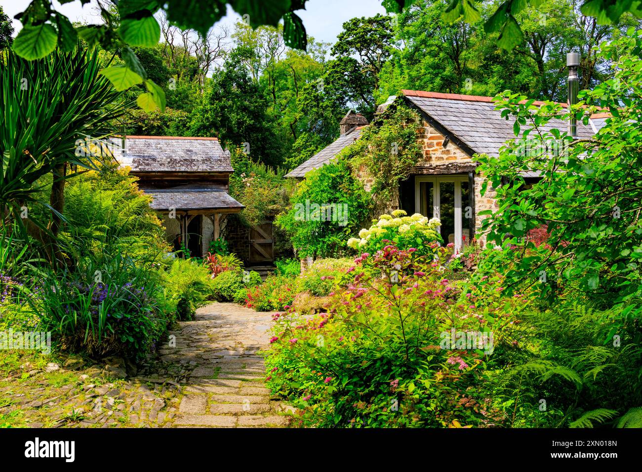 An attractive mixture of colourful planting and hard landscaping at ...