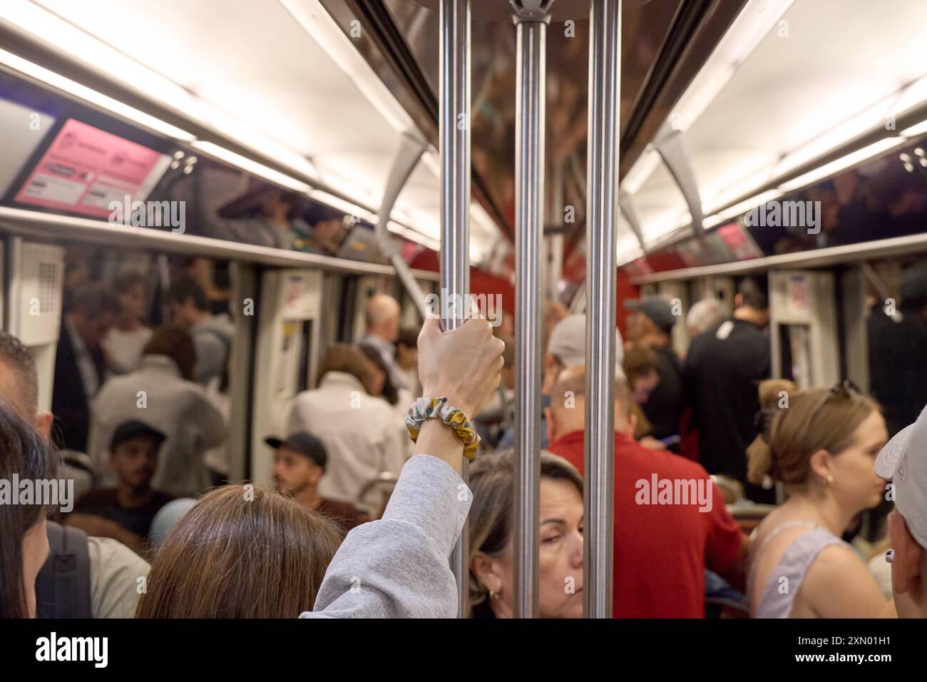 Paris, France - July 13, 2024: Interior of a Paris subway with many ...