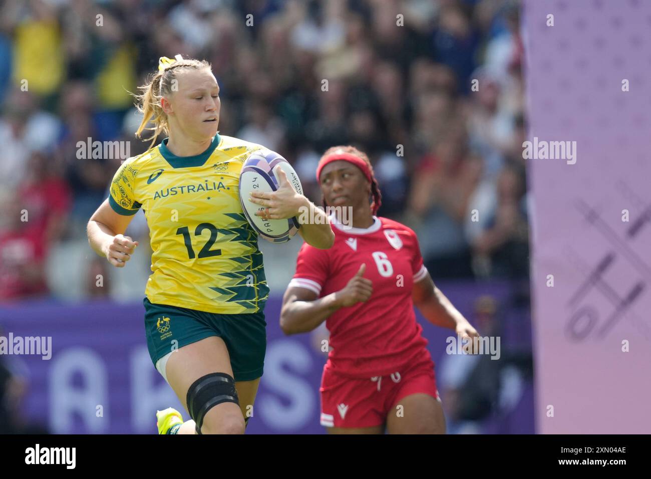 Australia's Maddison Levi runs over the line and scores a try during ...