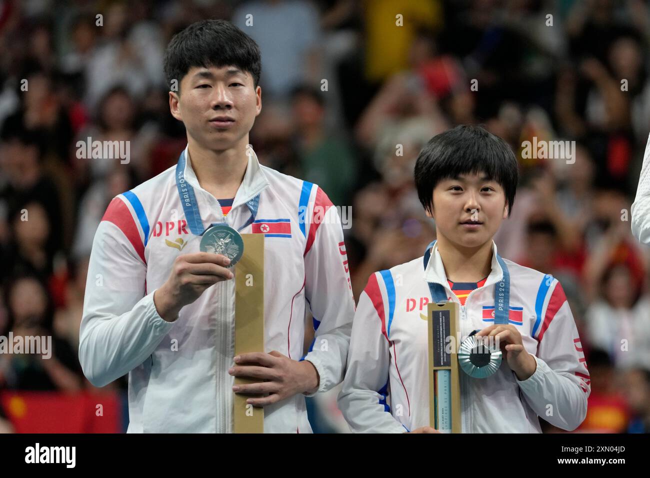 North Korea's Ri Jong Sik, left, and Kim Kum Yong pose with their ...