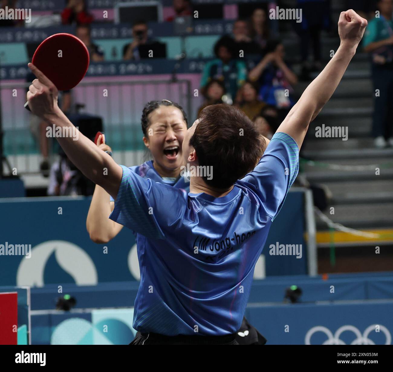 Paris, France. 30th July, 2024. South Korean Lim Jong-Hoon and Shin Yu-bin celebrate victory ...