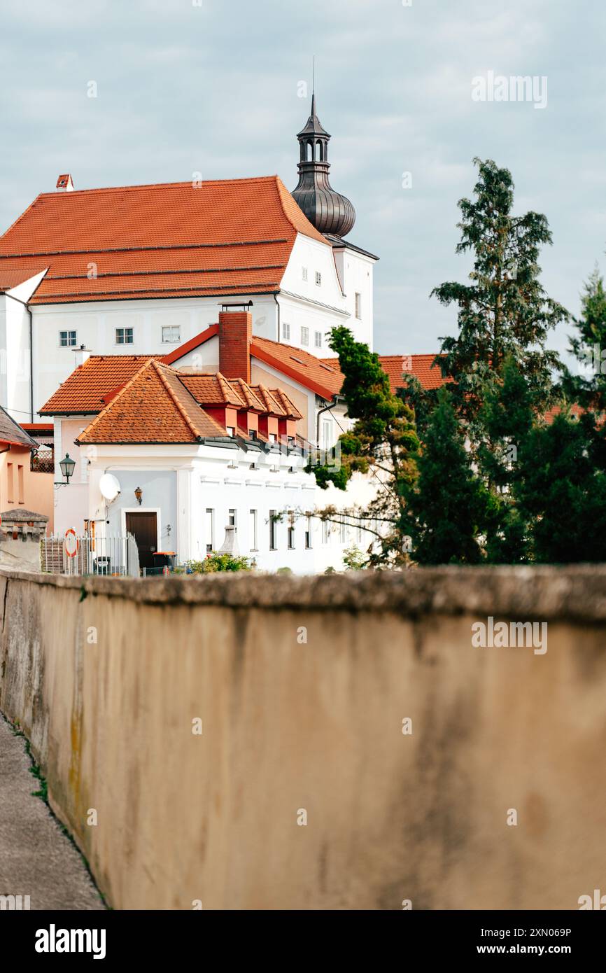 A quaint European town features well-preserved historic architecture ...