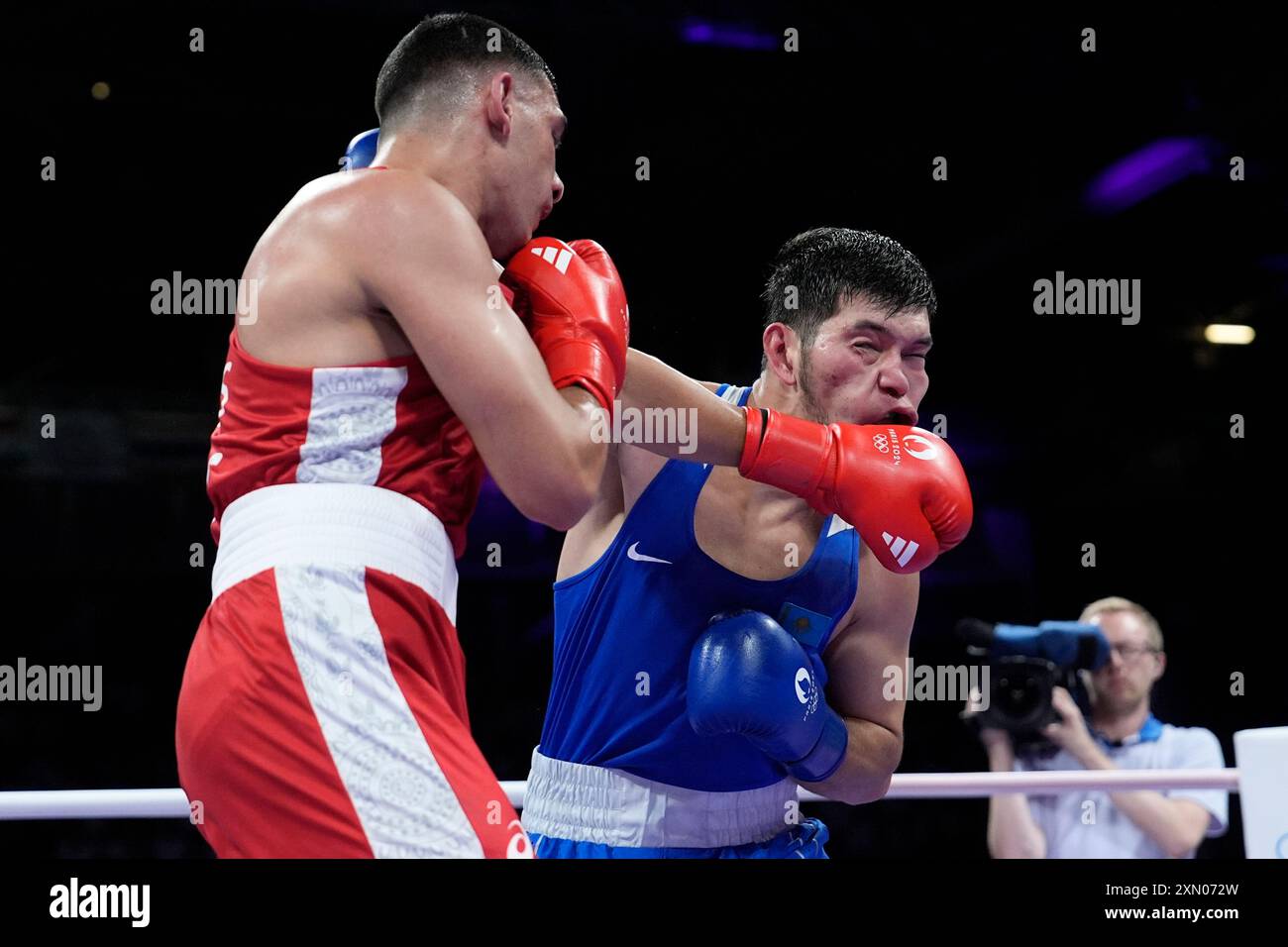 Australia's Callum Peters, left, fights Kazakhstan's Nurbek Oralbay in ...