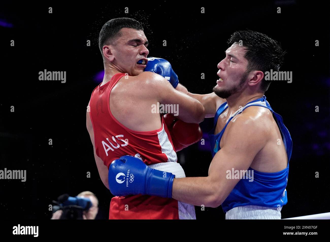 Australia's Callum Peters, left, fights Kazakhstan's Nurbek Oralbay in ...