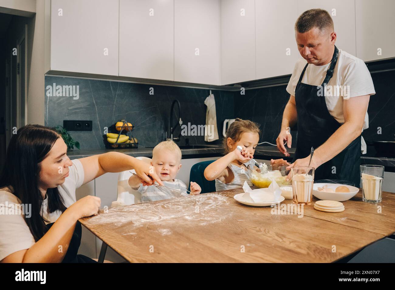 Engaging in Family Baking Activities Together in a Bright and Modern ...